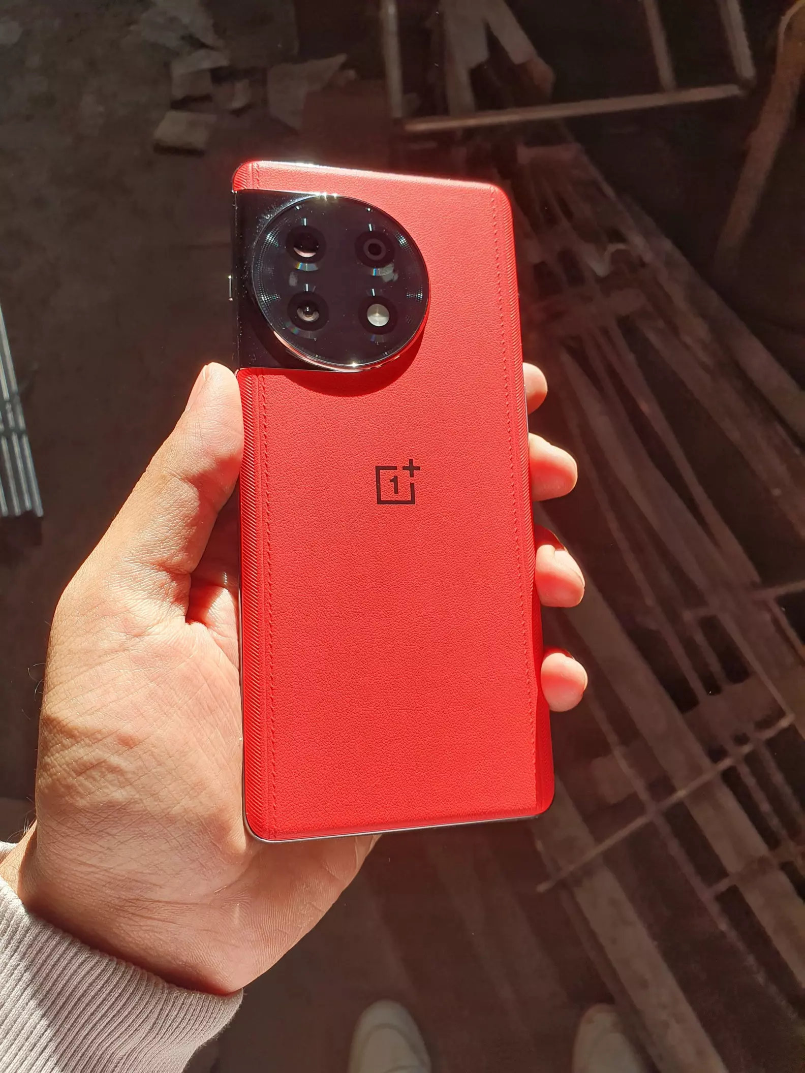 The Solar Red color variant of the OnePlus 11R exudes a capt