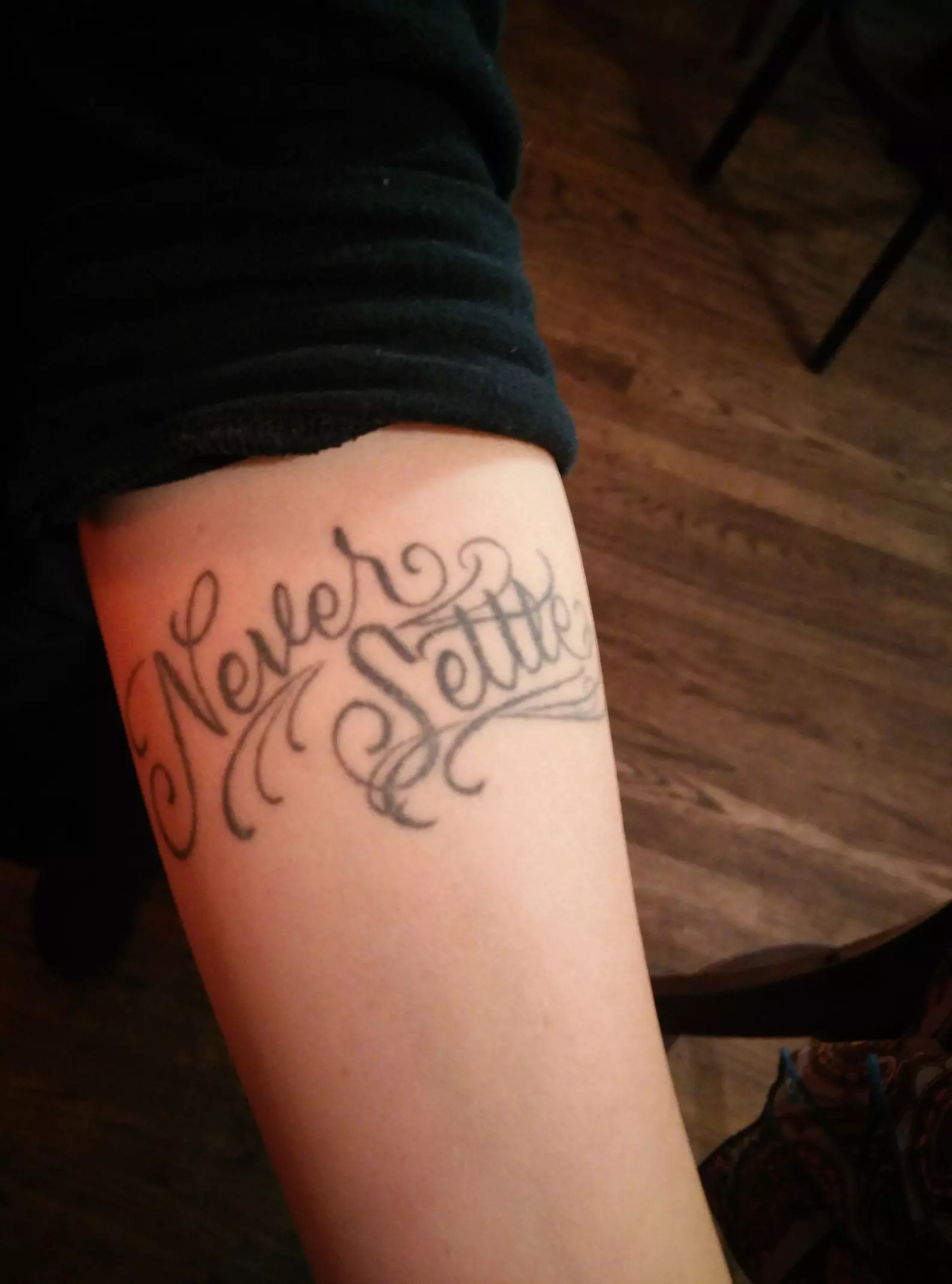 never settle for less tattoo